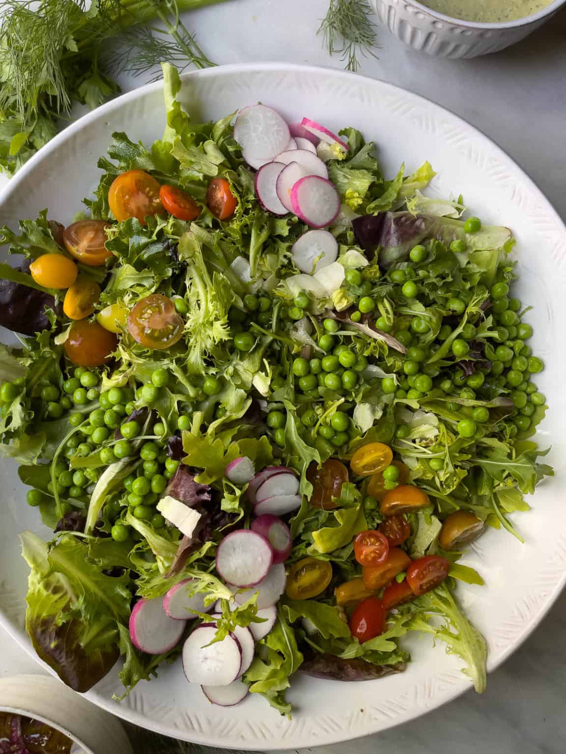 Simple Green Spring Salad with Herby Tahini Dressing - The Kitcheneer